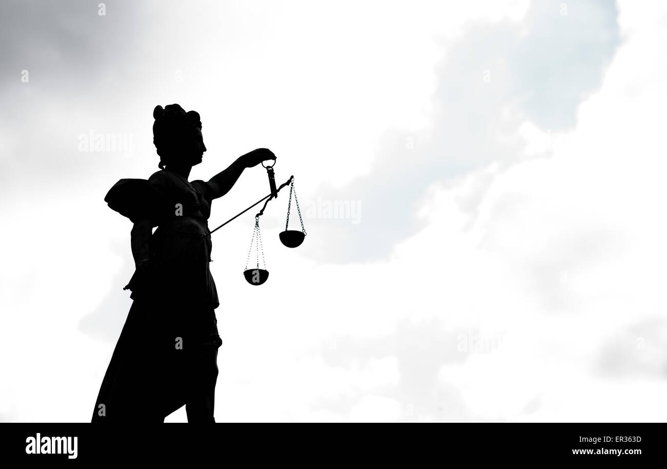 The statue of Justitia, the Roman goddess of justice, stands with a ...