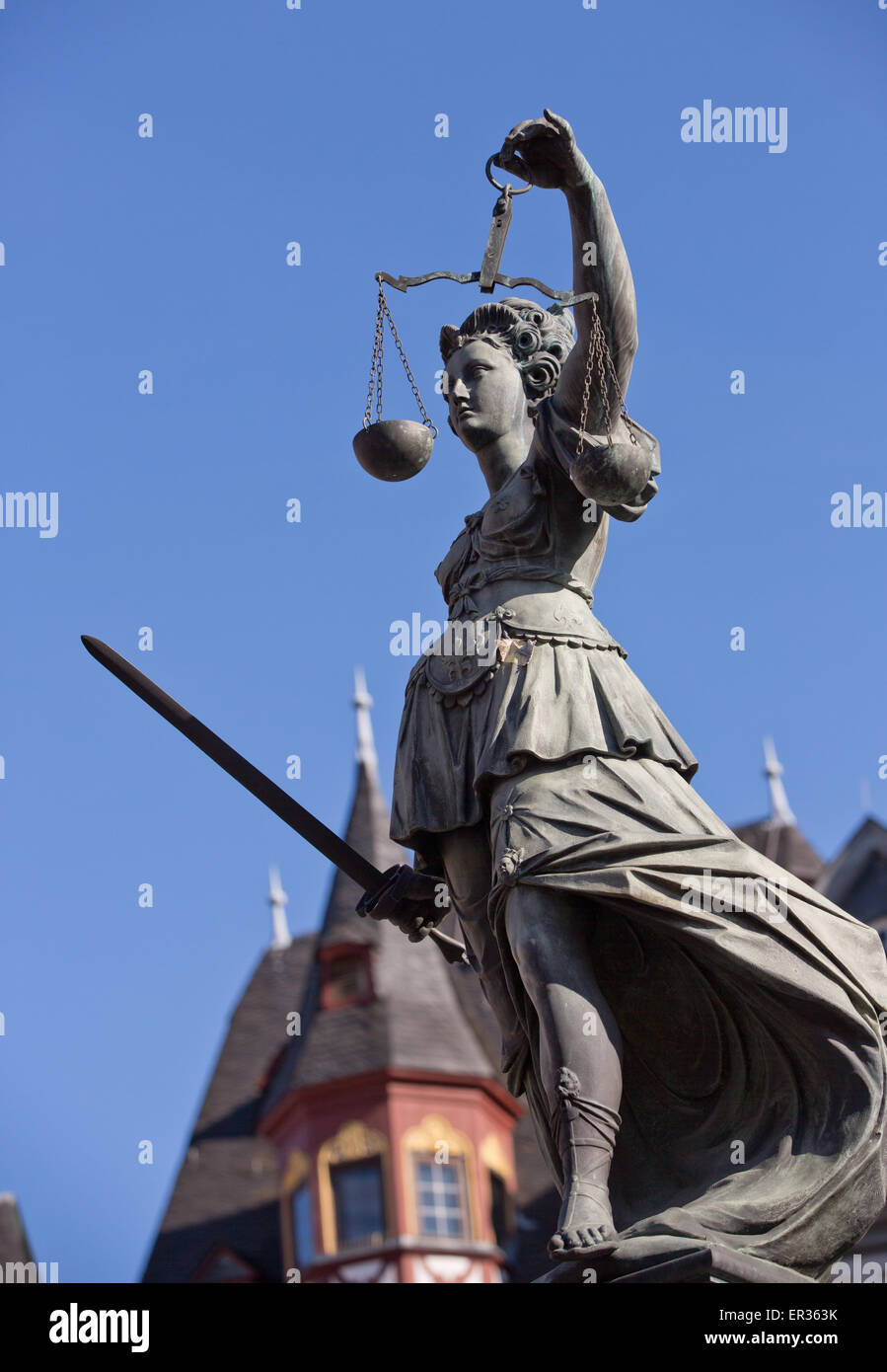 The statue of Justitia, the Roman goddess of justice, stands with a ...