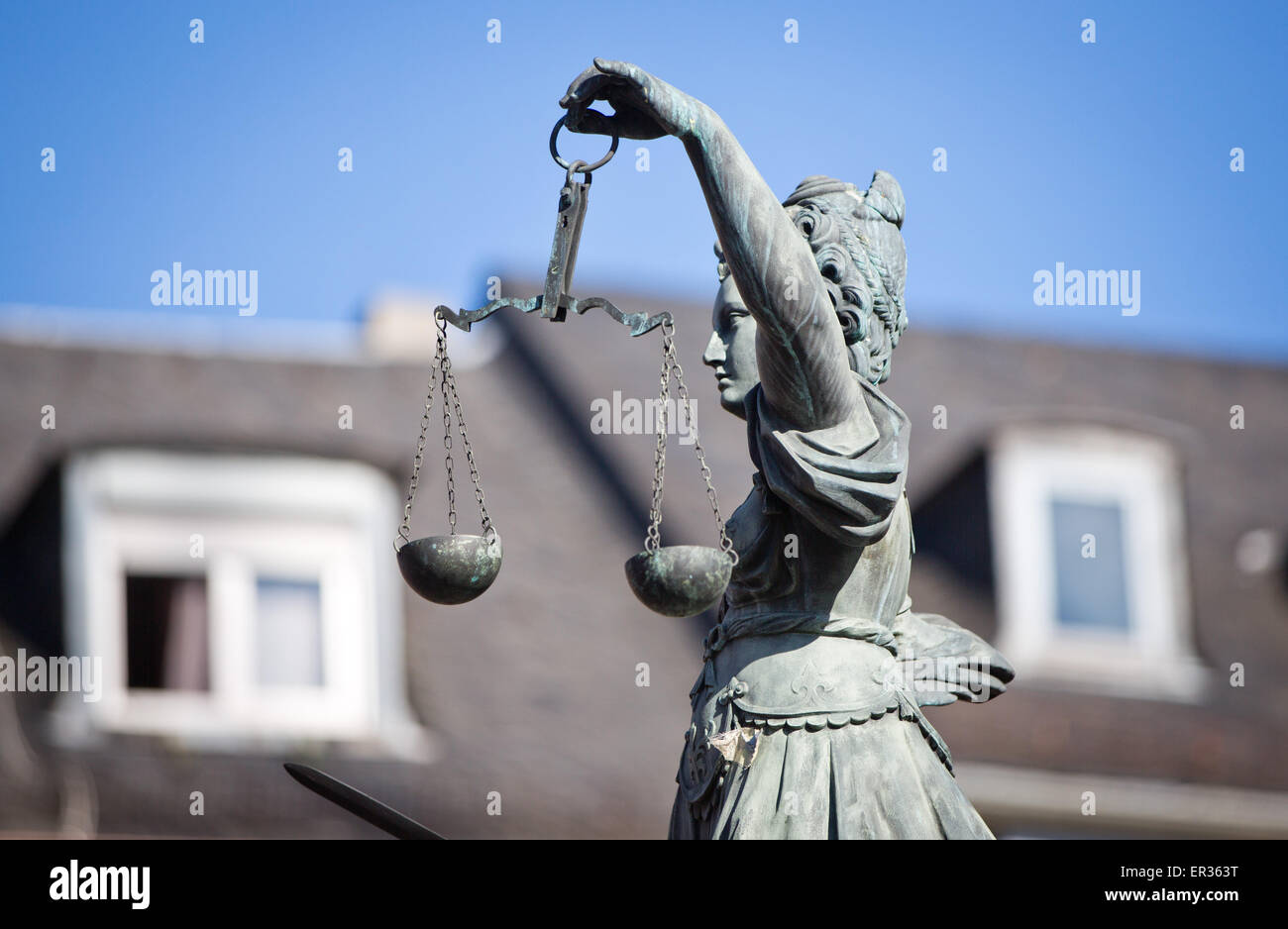 The statue of Justitia, the Roman goddess of justice, stands with a ...