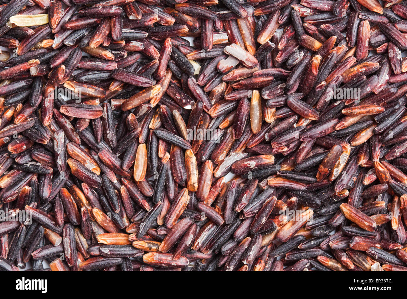 Brown rice pattern full frame background Stock Photo - Alamy