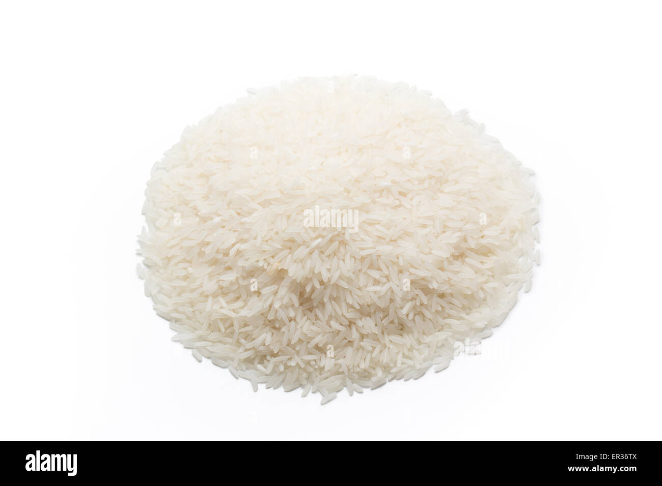 rice on a pile isolated on white background Stock Photo - Alamy