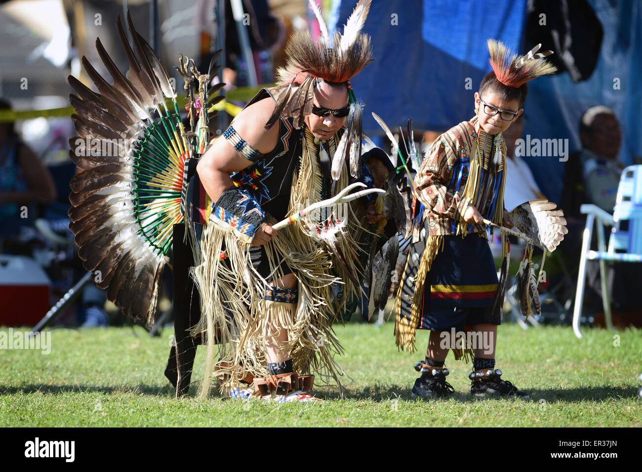 Dressed in traditional ceremonial costume Native Americans takes part ...
