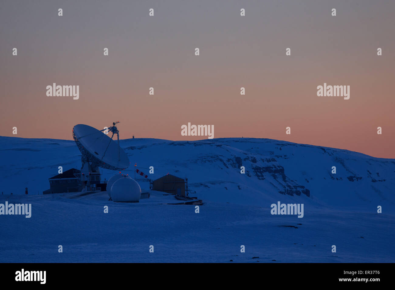 A giant VLBI antenna from the Norwegian Mapping Authority (NMA) turns ...