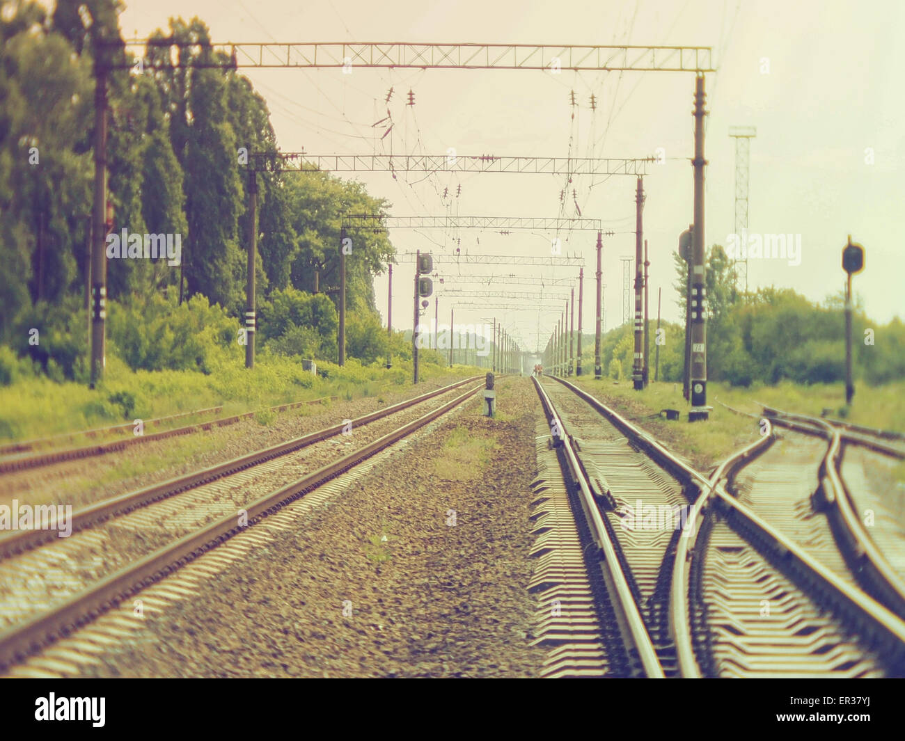 May 26, 2015 - Train railroad disappearing in the distance. Soft focus ...