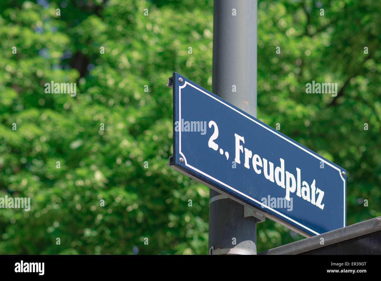 Vienna street sign, a sign in Vienna's Prater district reflects the ...