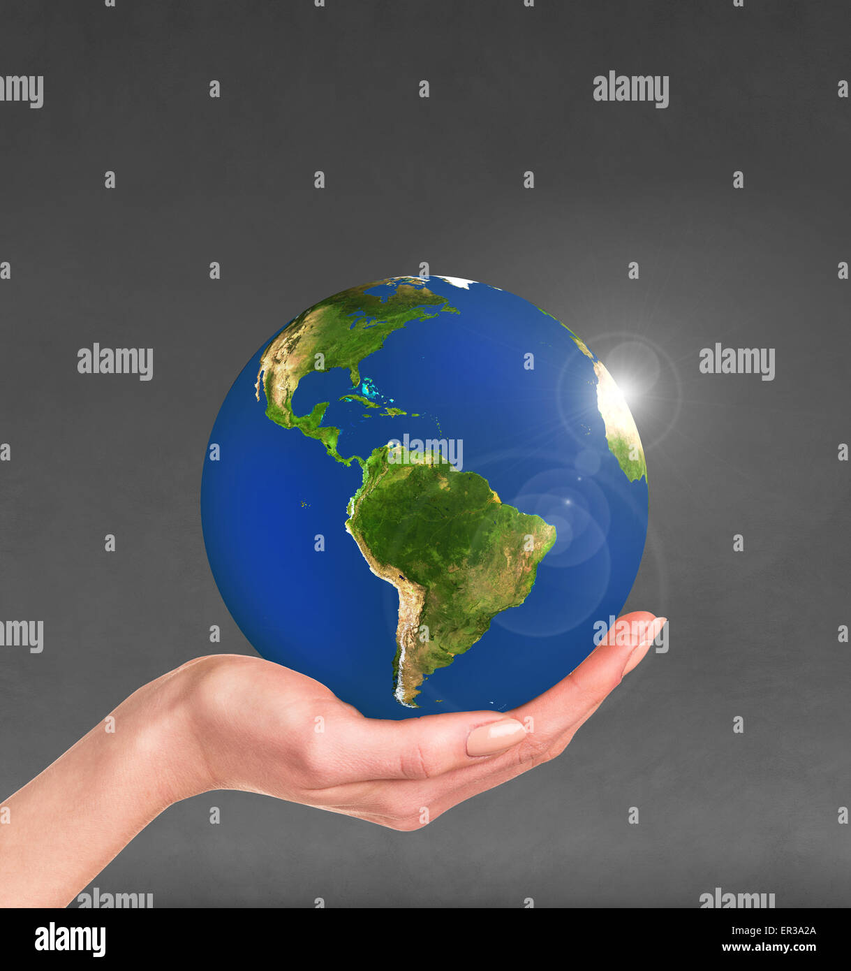 Planet earth in a human hand Stock Photo - Alamy