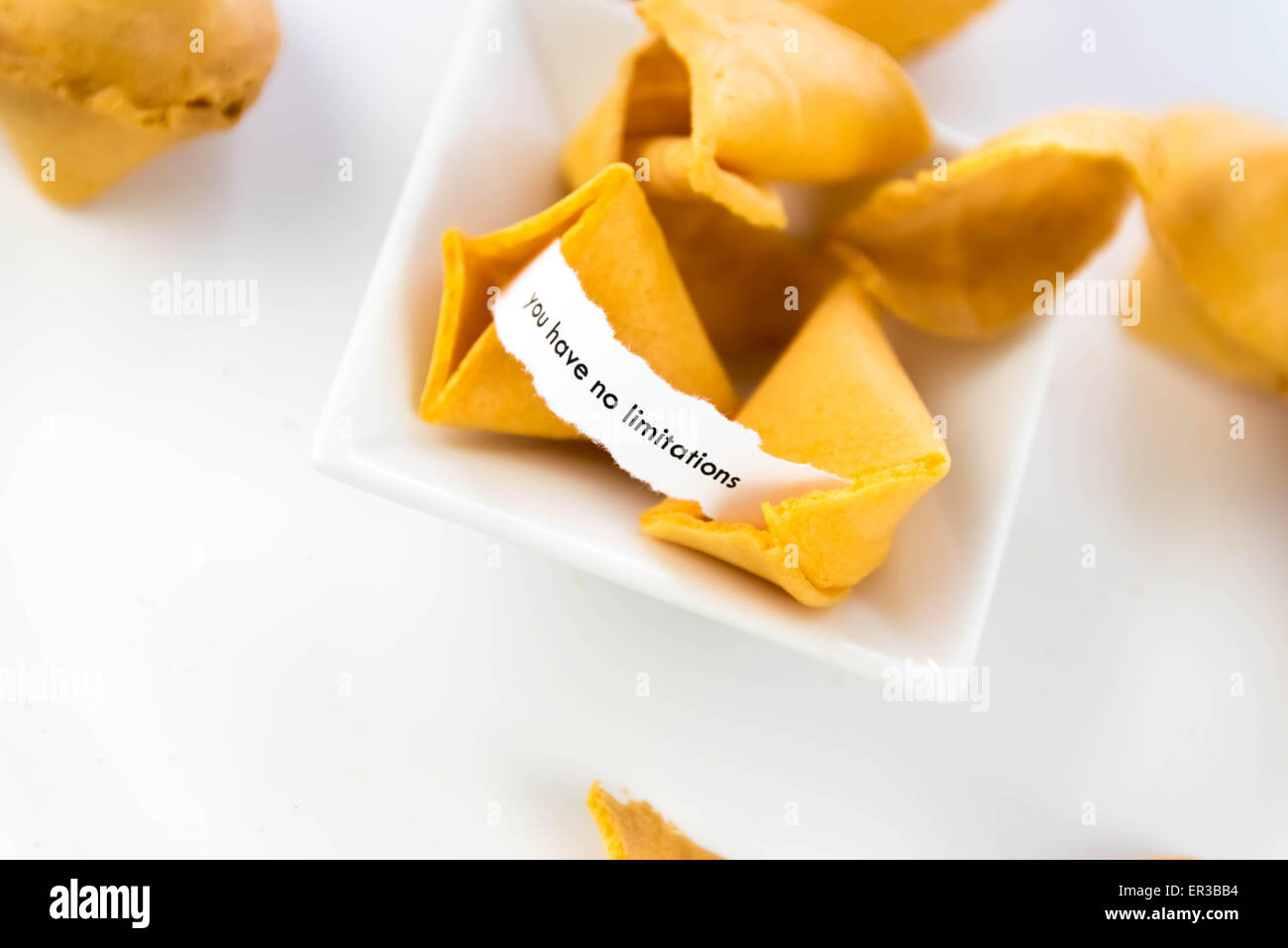 open fortune cookie with strip of white paper - YOU HAVE NO LIMITATIONS ...