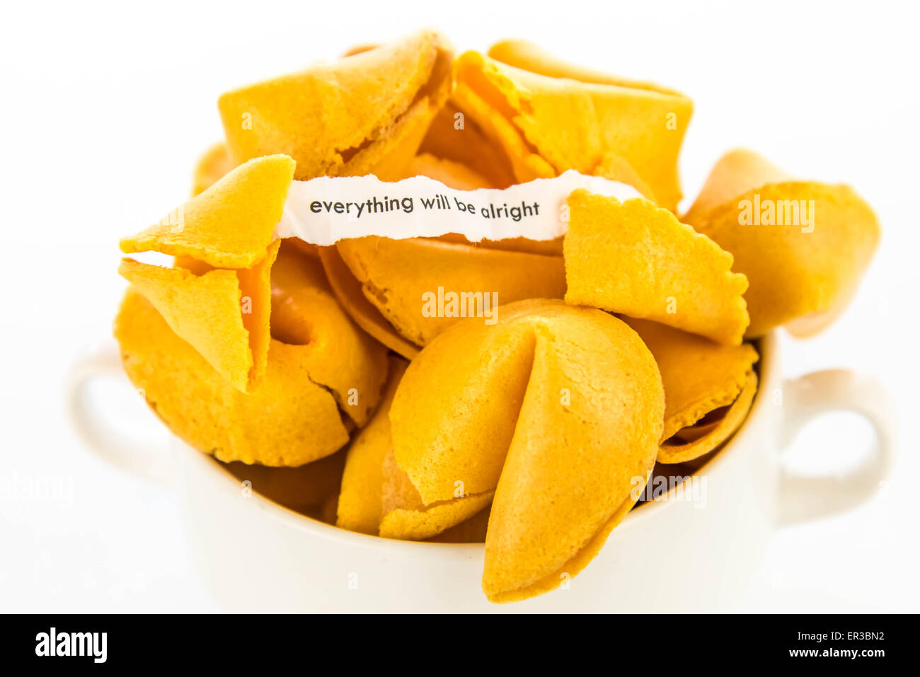 open fortune cookie with strip of white paper - EVERYTHING WILL BE ...