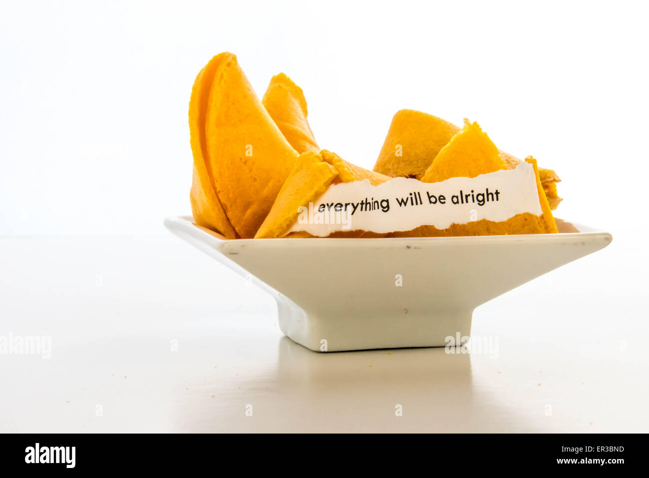 open fortune cookie with strip of white paper - EVERYTHING WILL BE ...