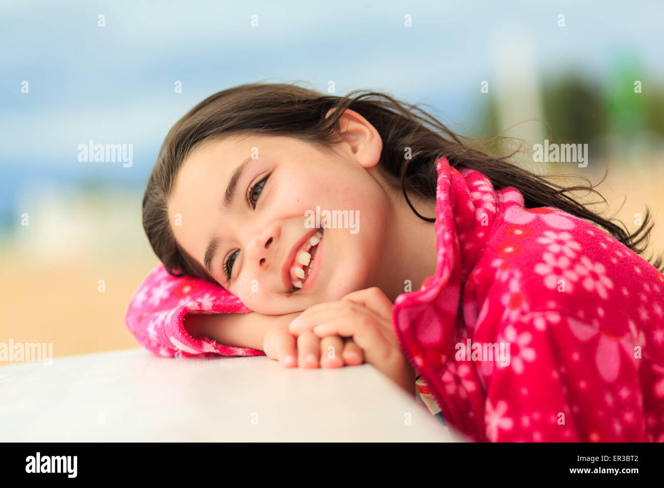 Girl resting head on table hi-res stock photography and images - Alamy