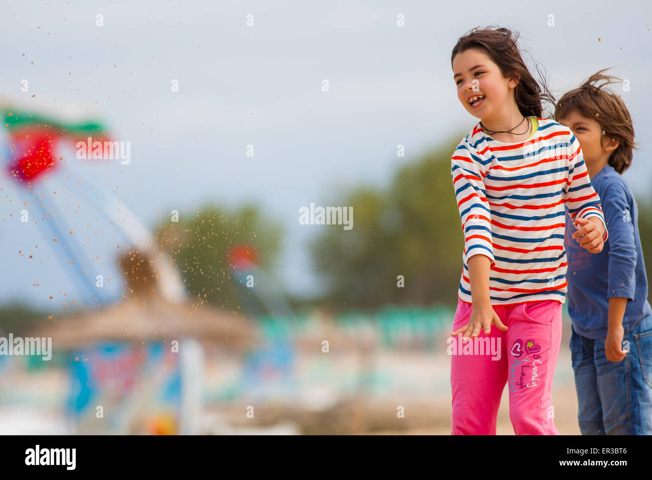 Sand throwing hi-res stock photography and images - Alamy