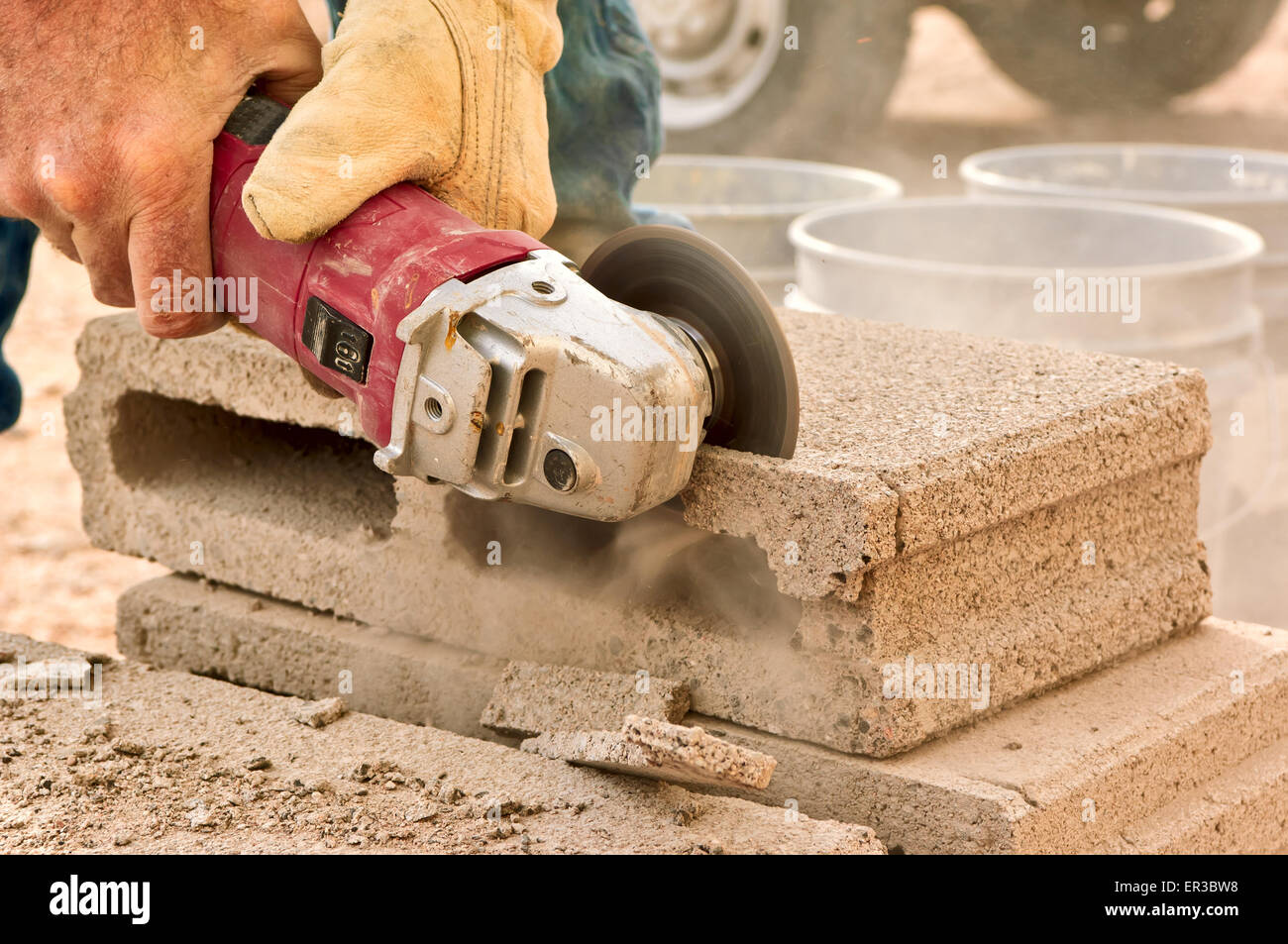Close-up of a construction worker using an electric grinding tool Stock ...