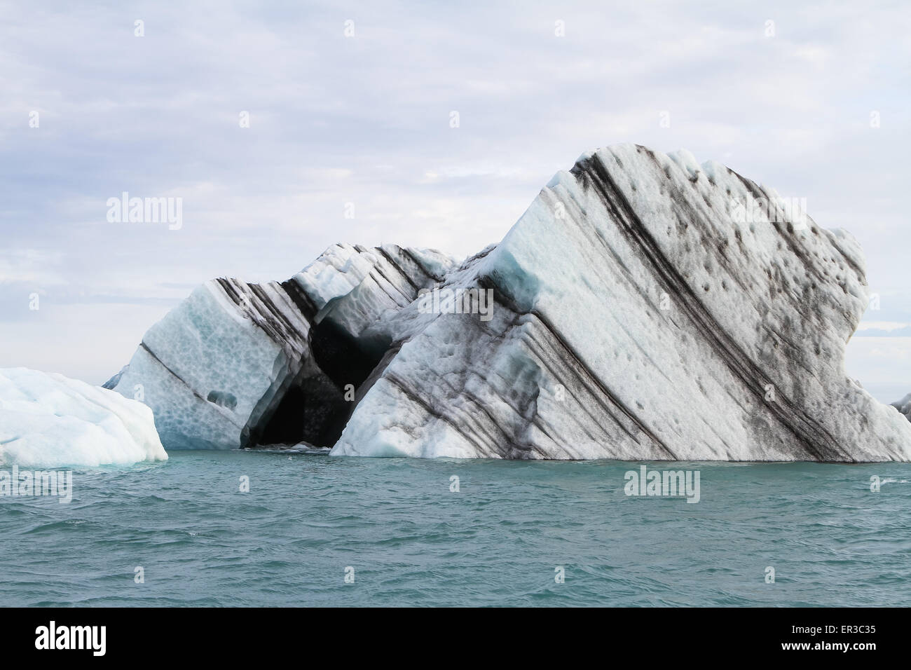 Close-up of a black striped iceberg, Jokulsarlon, Vatnajokull Glacier ...