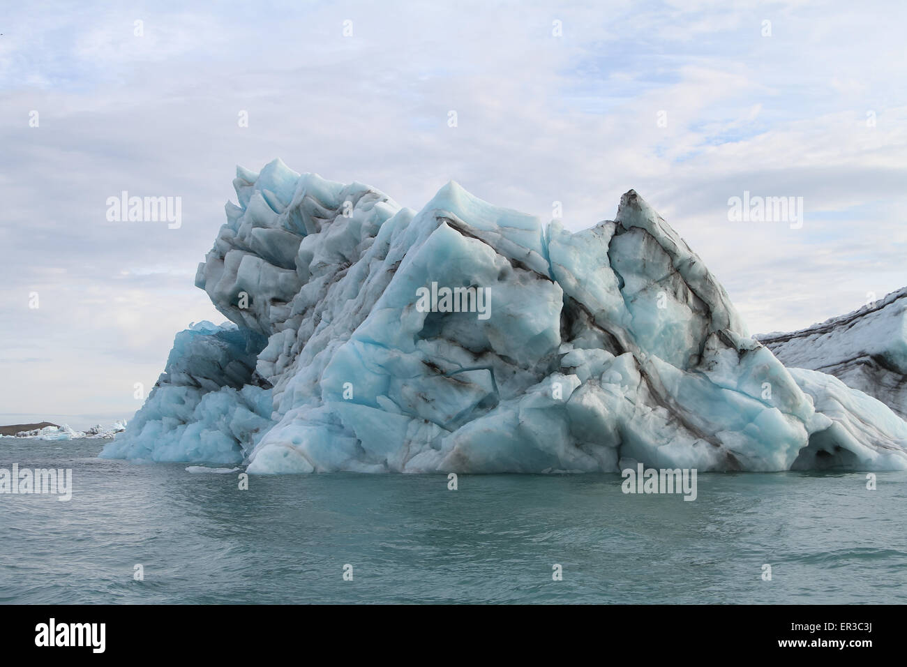 Close-up of a black striped iceberg, Jokulsarlon, Vatnajokull Glacier ...