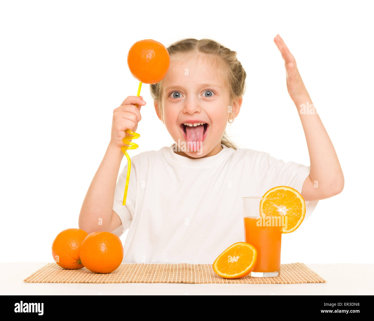 little girl with oranges drink juice with a straw Stock Photo - Alamy