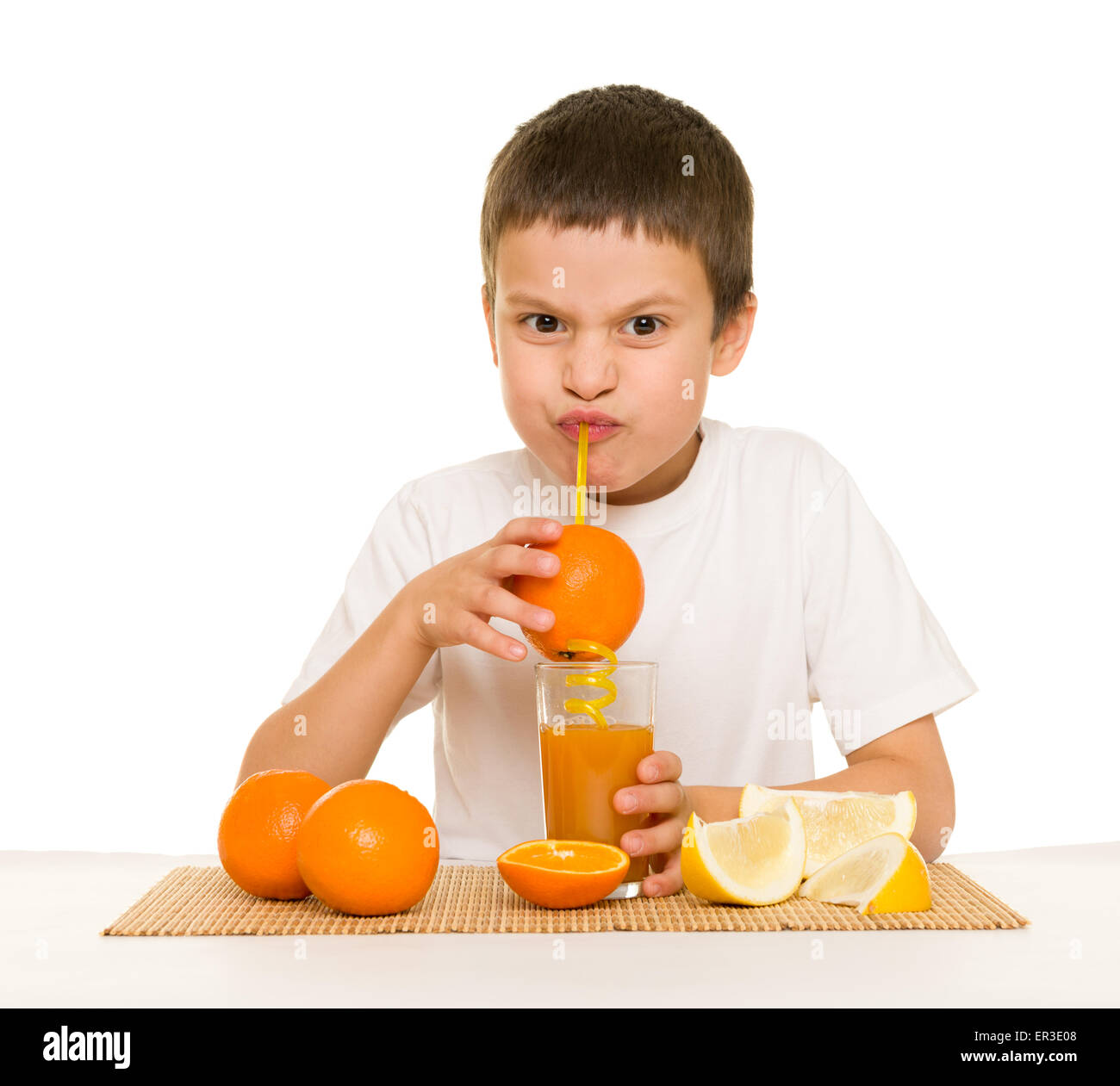 boy drink orange juice with a straw Stock Photo - Alamy