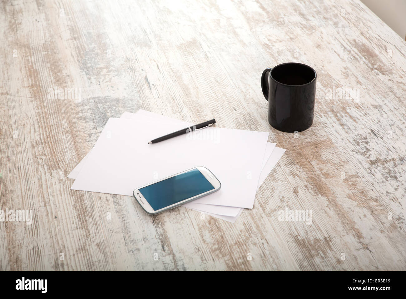 Taking notes at the table with coffee and smartphones Stock Photo - Alamy