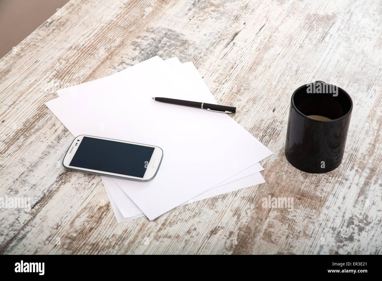 Taking notes at the table with coffee and smartphones Stock Photo - Alamy