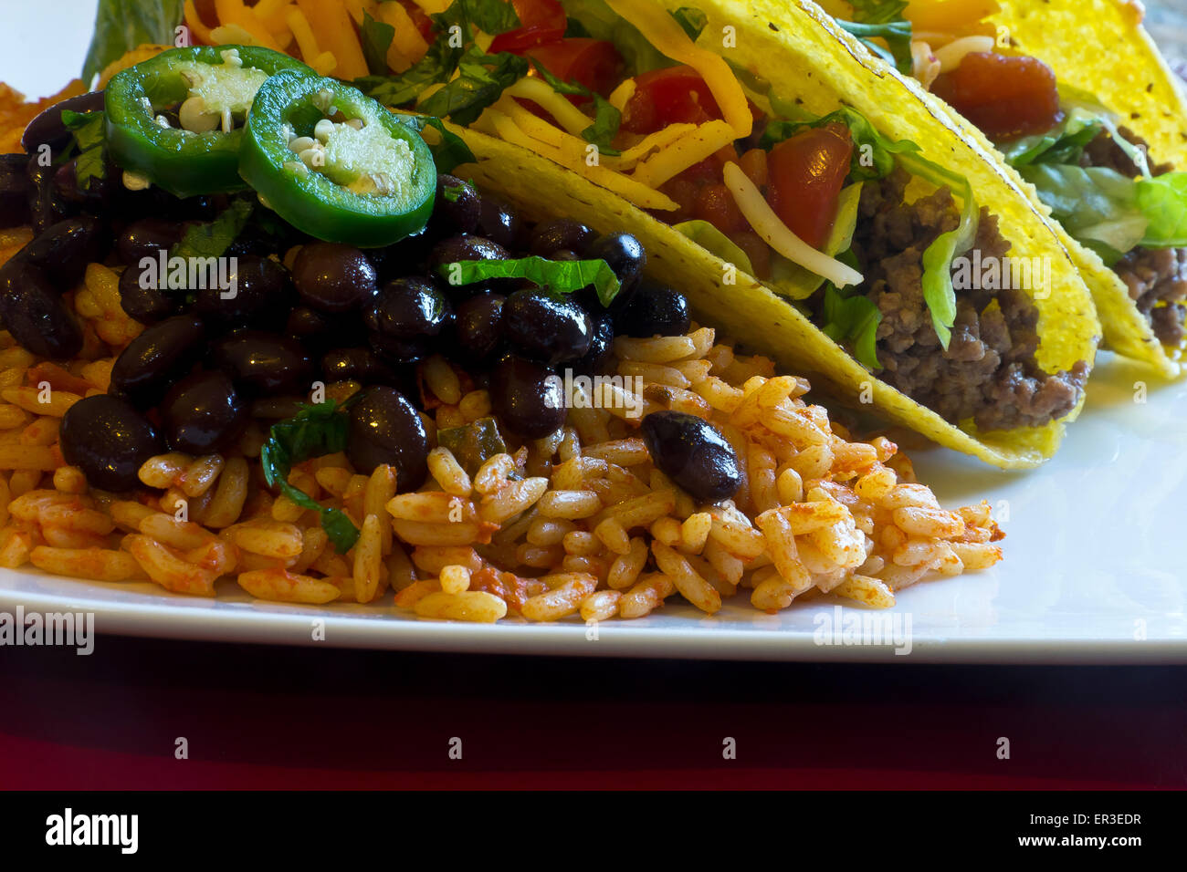 Mexican tacos with rice, black beans, and jalapenos Stock Photo - Alamy