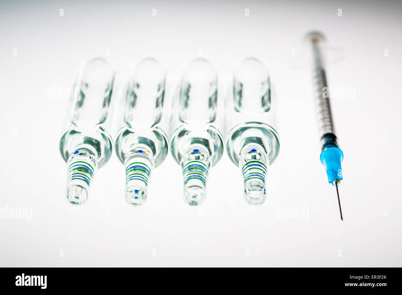 Syringe and phials Stock Photo - Alamy