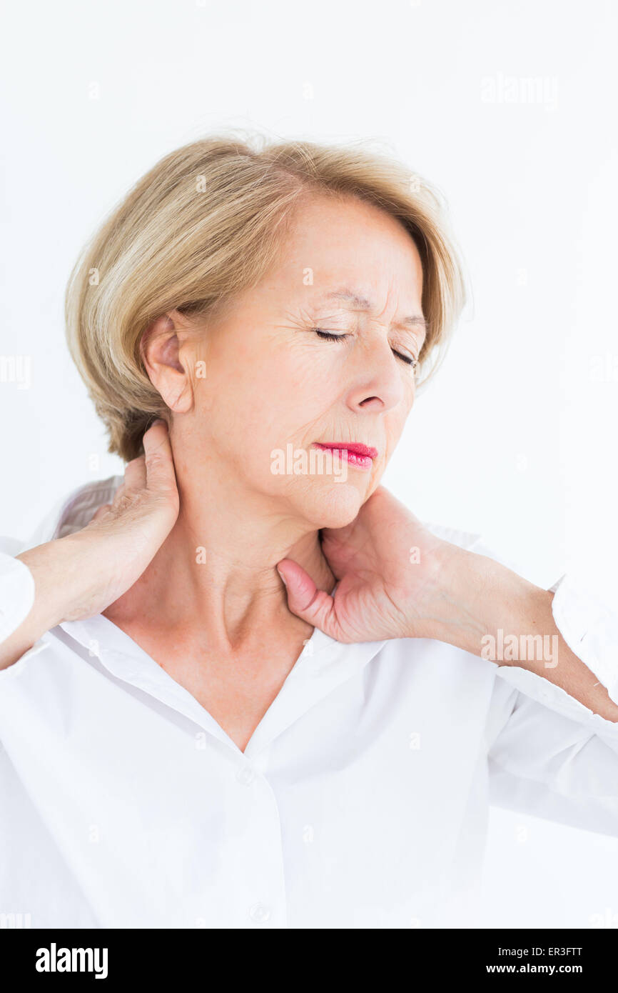Old senior woman neck pain hi-res stock photography and images - Alamy