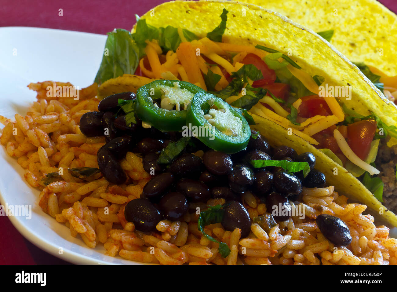 Mexican tacos with rice, black beans, and jalapenos Stock Photo - Alamy