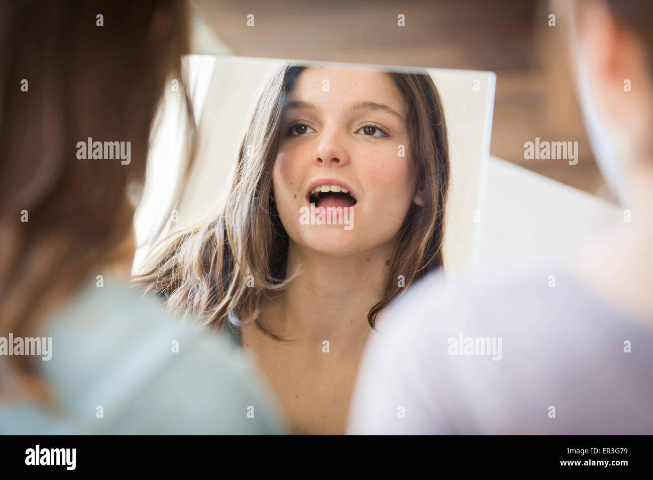 Treatment of stuttering : woman doing articulation and breathing ...