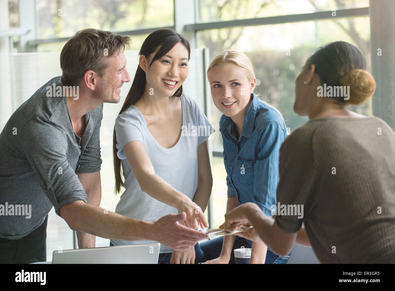 Project team working together Stock Photo - Alamy
