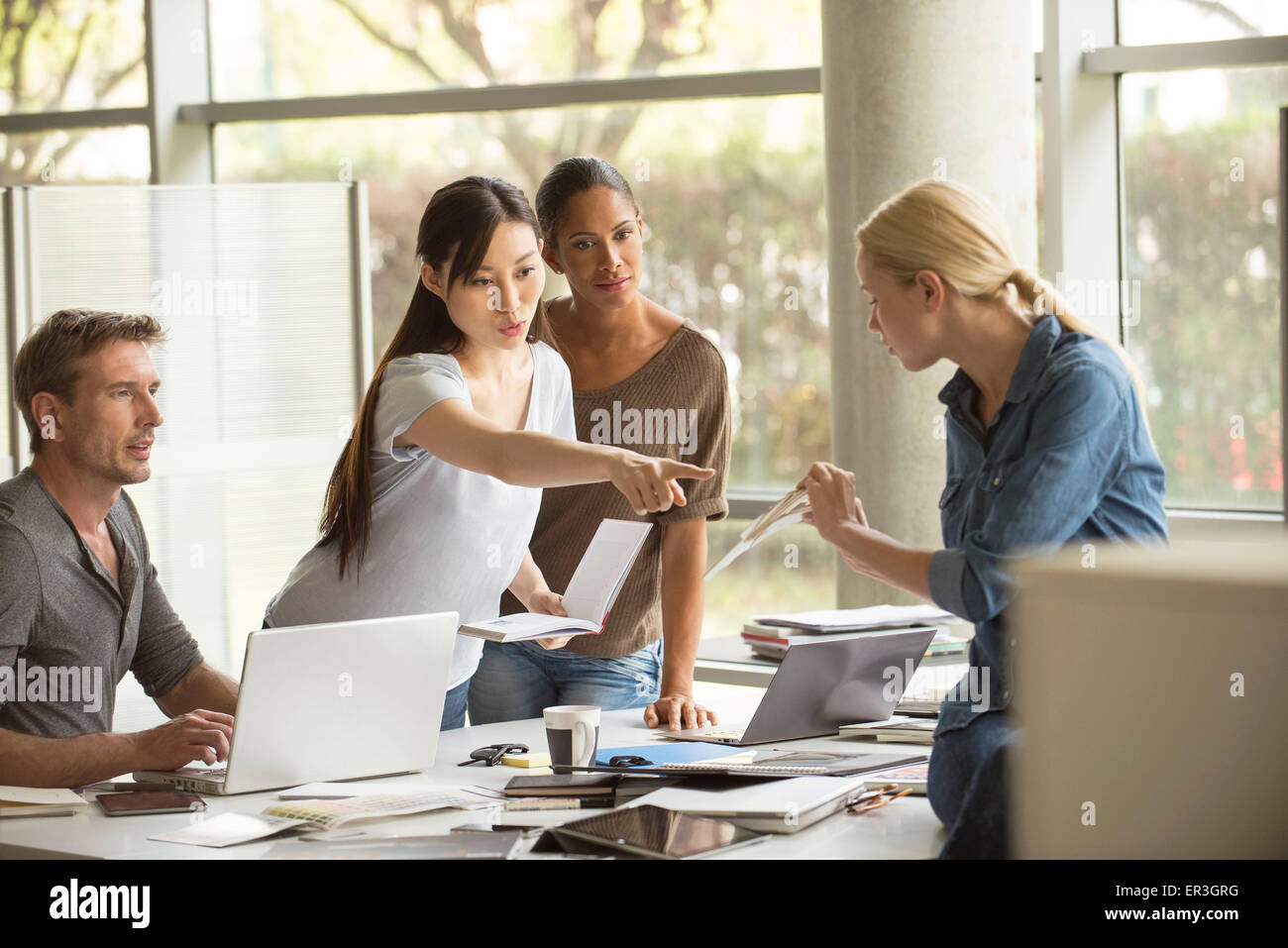 Colleagues sharing ideas Stock Photo - Alamy
