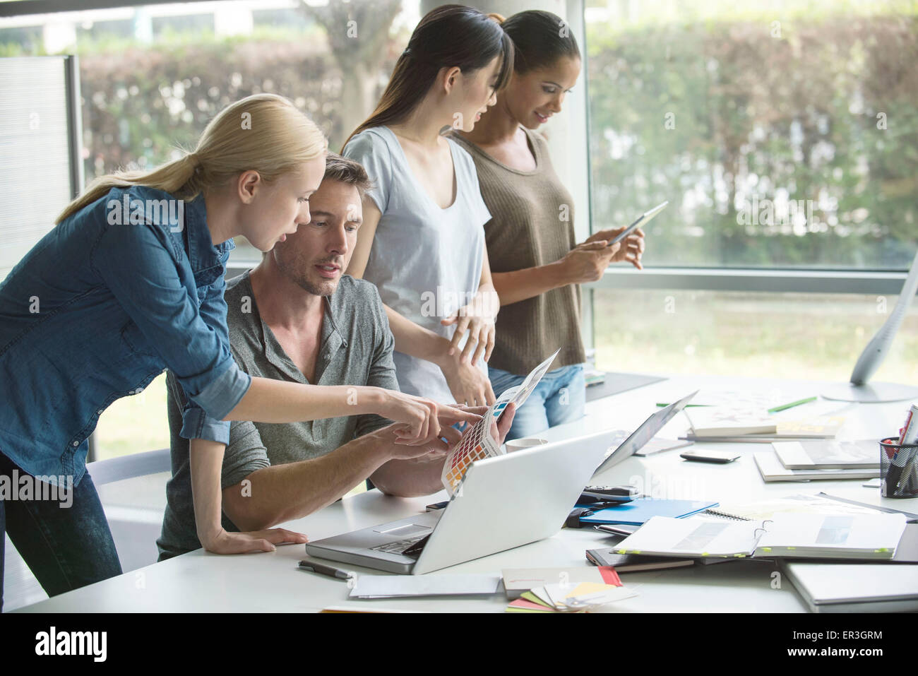 Project team working closely together Stock Photo - Alamy