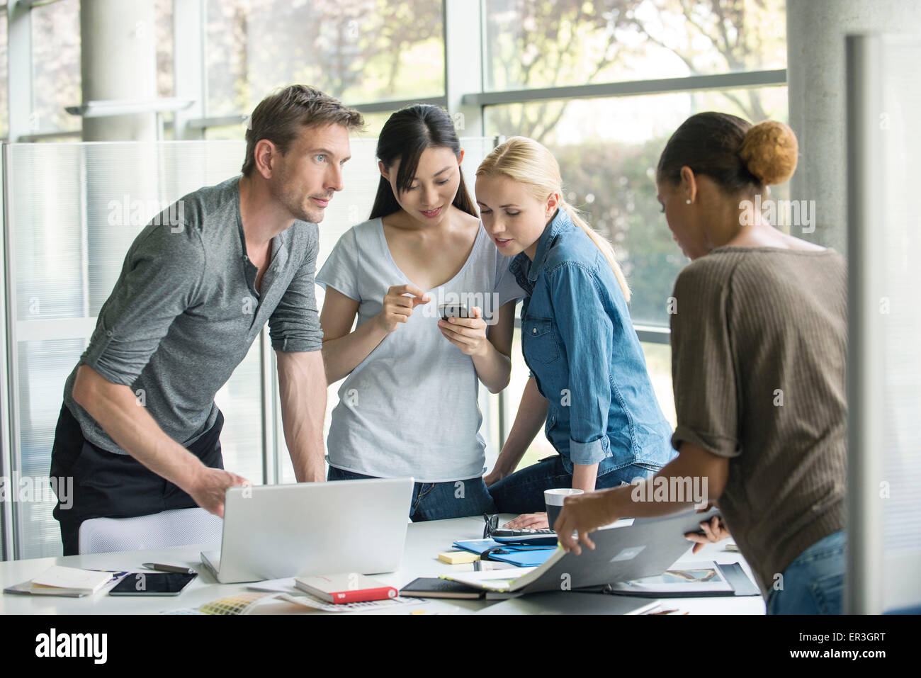 Colleagues collaborating hi-res stock photography and images - Alamy