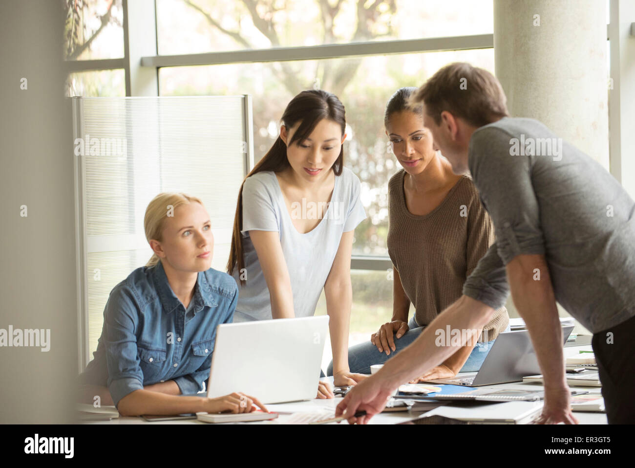 Colleagues sharing ideas Stock Photo - Alamy