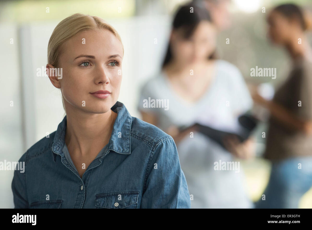 Young entrepreneur contemplates business hi-res stock photography and ...