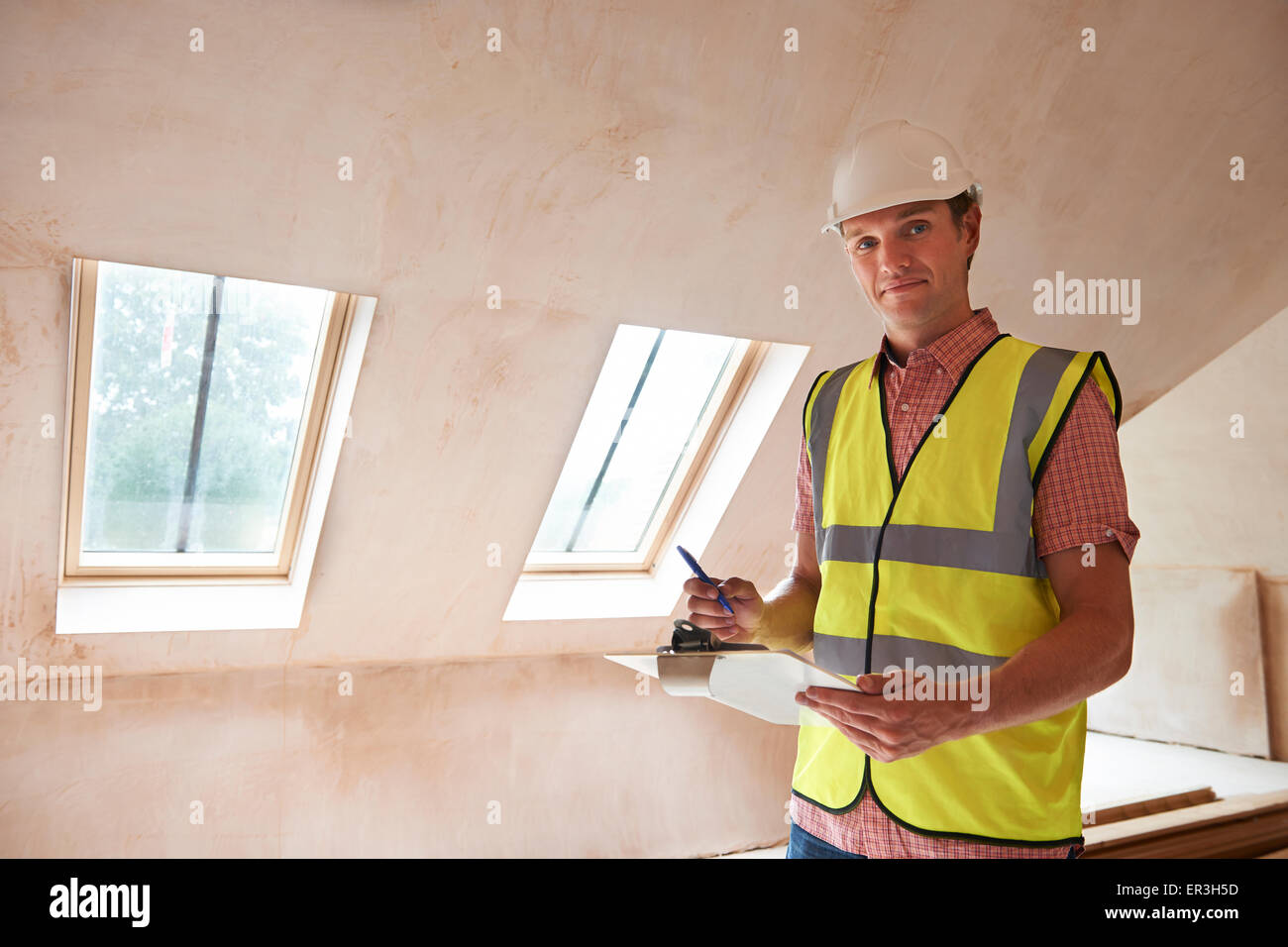 Building Inspector Looking At New Property Stock Photo - Alamy