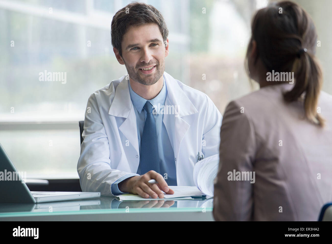Doctor meeting with patient Stock Photo - Alamy
