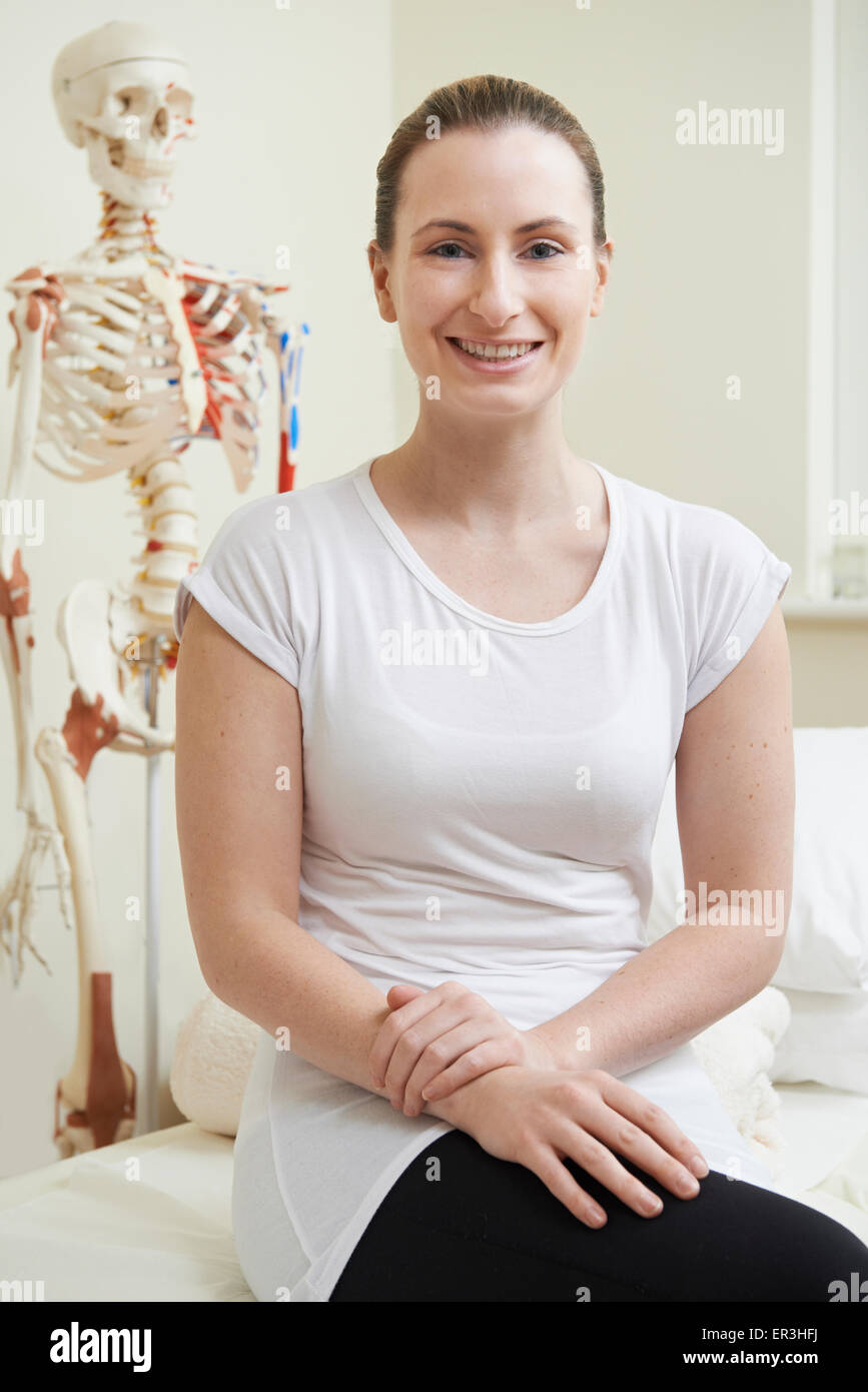 Portrait Of Female Osteopath In Consulting Room Stock Photo - Alamy