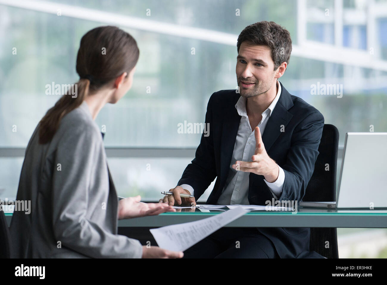 Businessman meeting with client Stock Photo - Alamy
