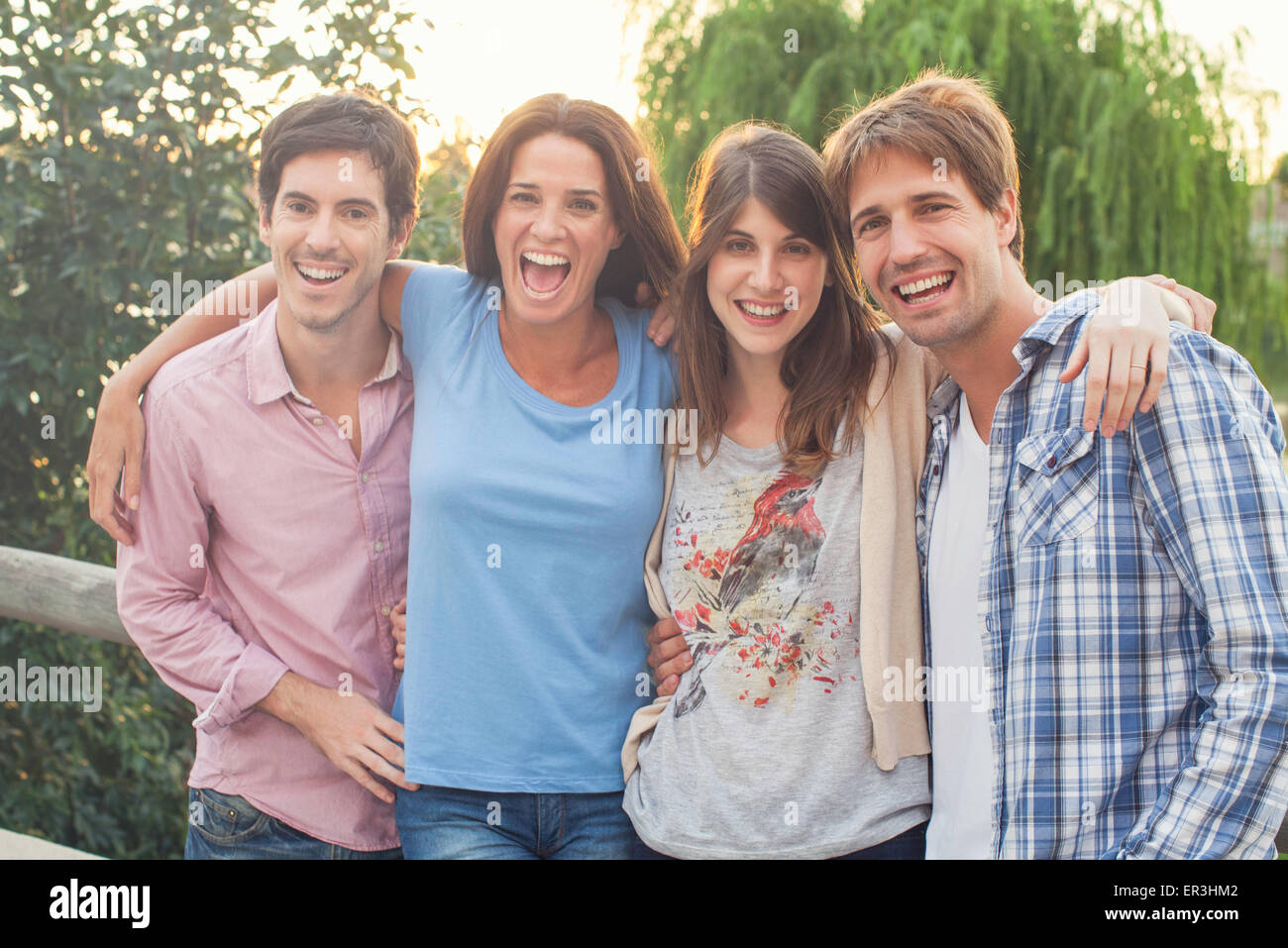 Friends posing together for group photo Stock Photo - Alamy