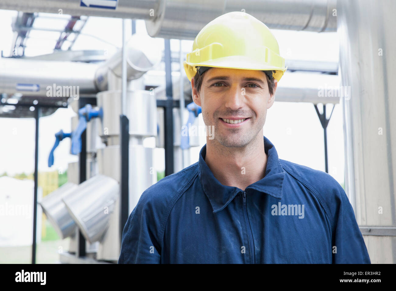 Engineer at industrial plant, portrait Stock Photo - Alamy