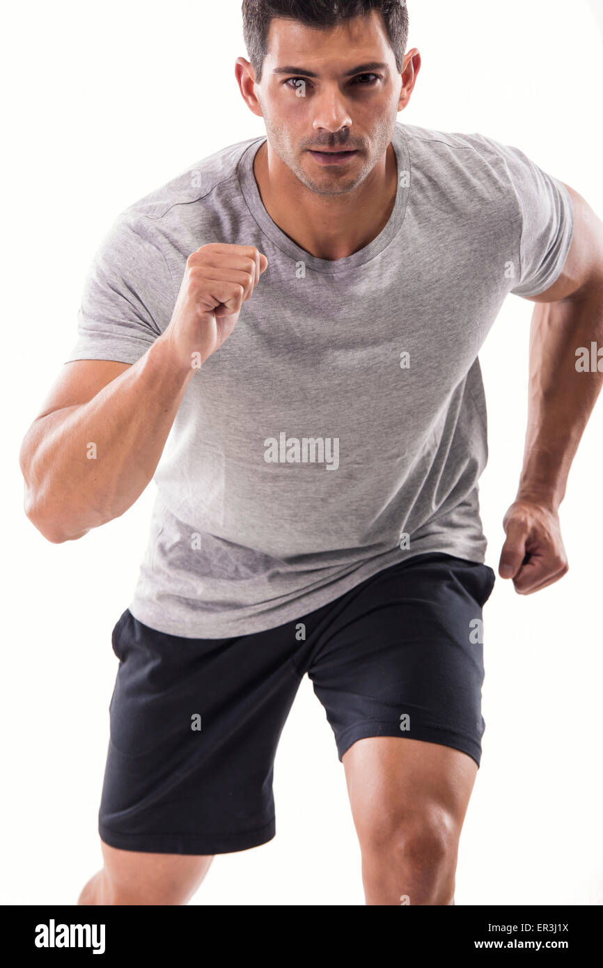 An athletic man running, isolated over a white background Stock Photo ...