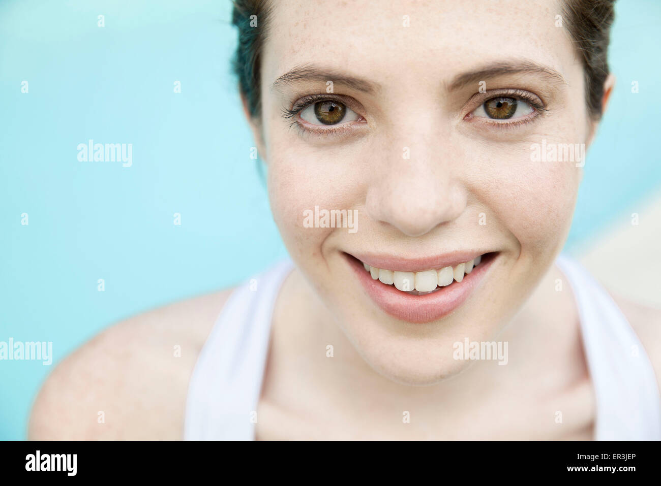 Young woman smiling cheerfully, portrait Stock Photo - Alamy