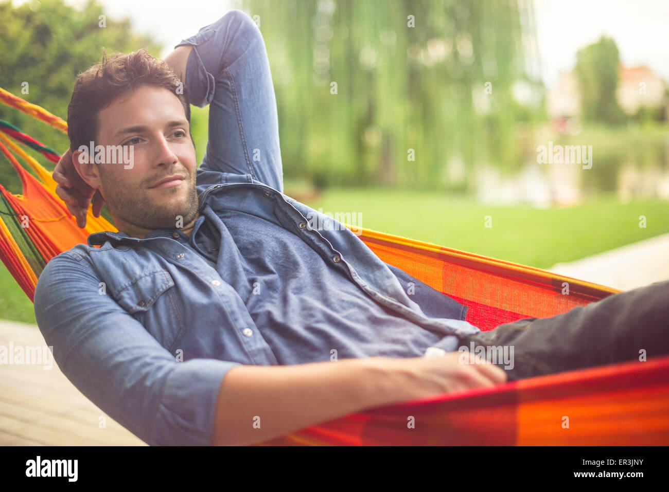 Man reclining hi-res stock photography and images - Alamy