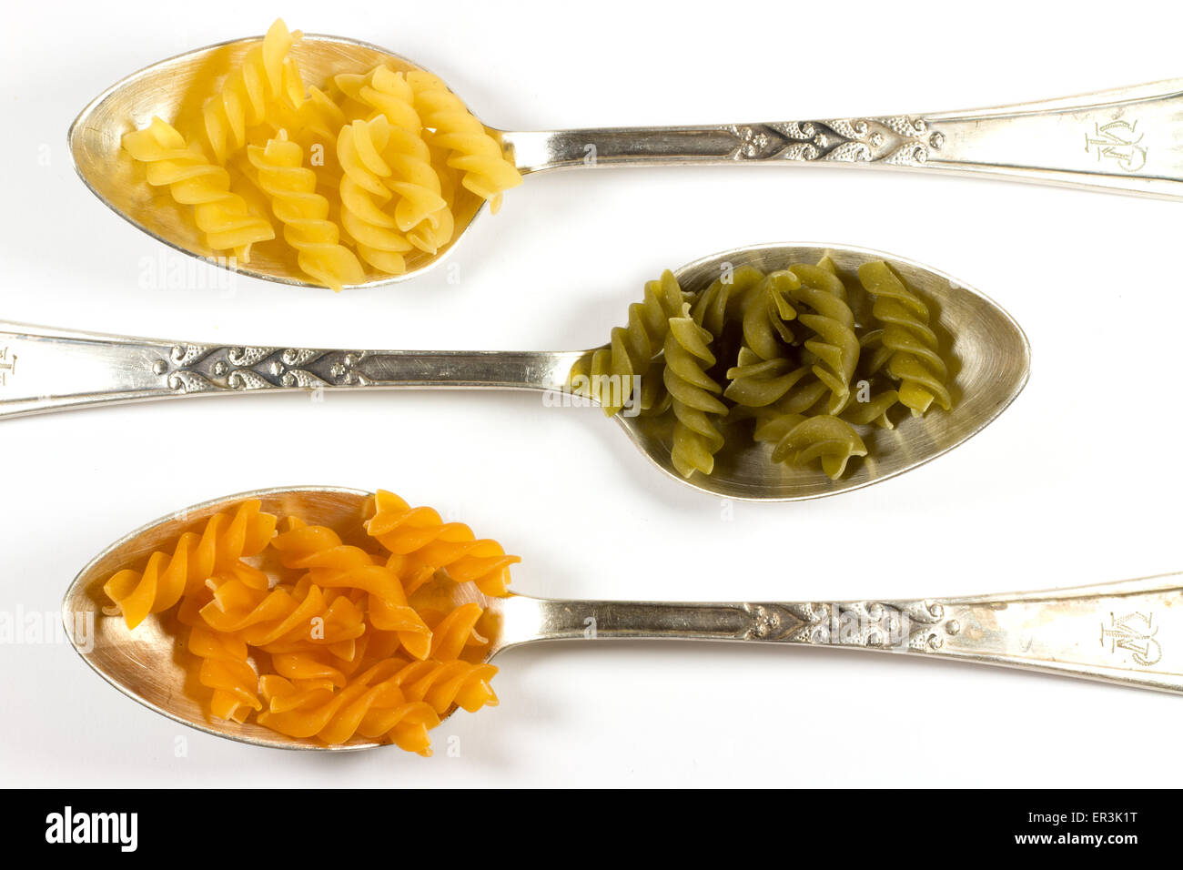 Colorful Pasta in Old Spoons Stock Photo - Alamy