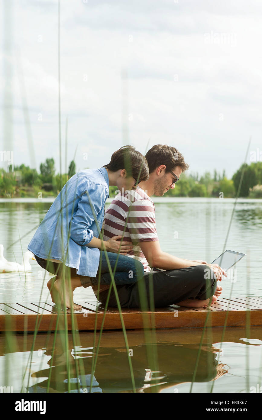 Young couple laptops in hi-res stock photography and images - Alamy