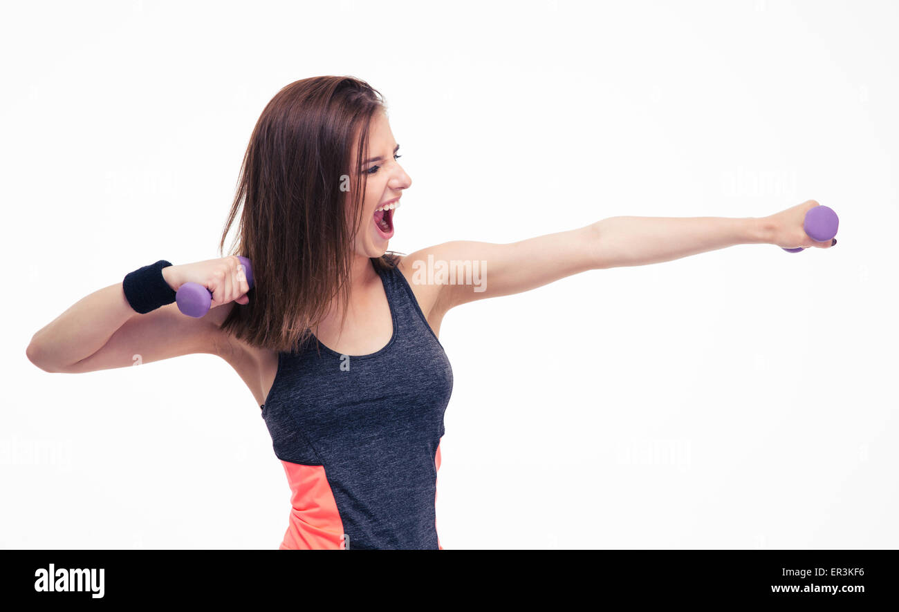 Screaming woman workout with dumbbells isolated on a white background ...