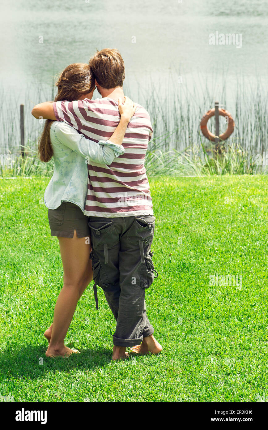 Young couple enjoying weekend holiday at lake Stock Photo - Alamy