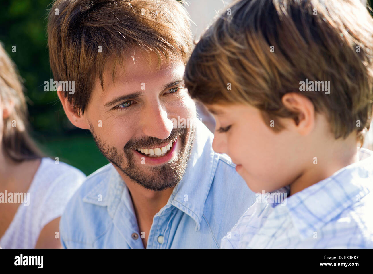 Father and son talking together outdoors Stock Photo - Alamy