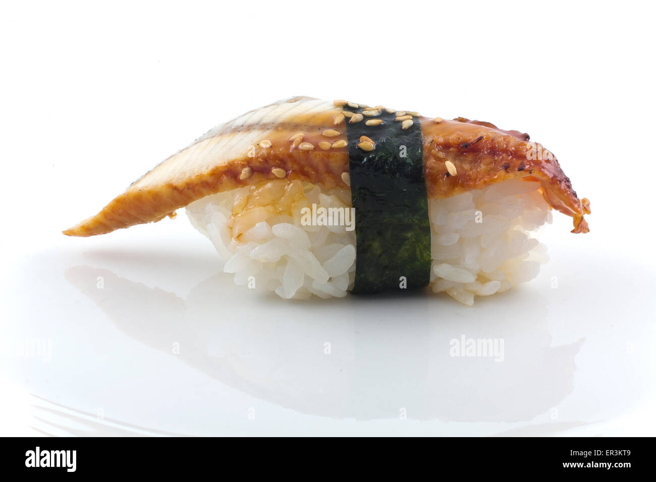 Barbecue eel sushi with sesame seeds and savory sauce isolated on white ...