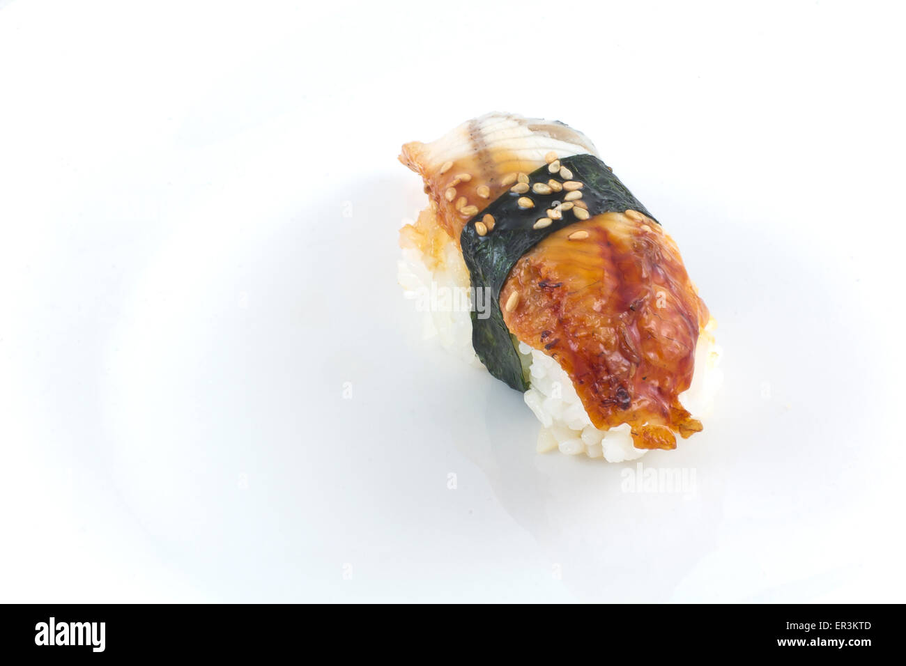 Barbecue eel sushi with sesame seeds and savory sauce isolated on white ...