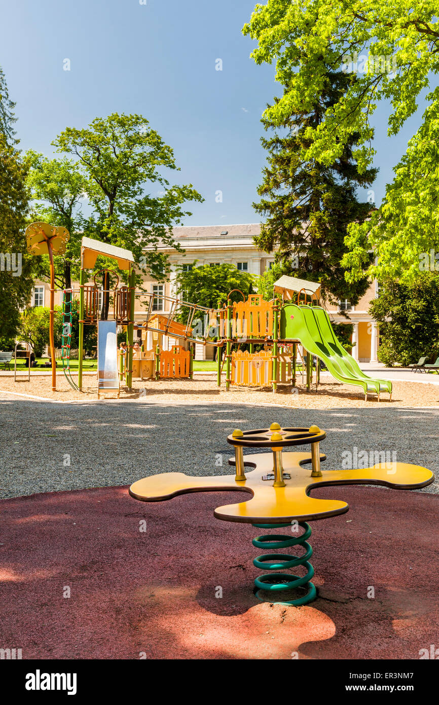 Yellow game for childrens in a park Stock Photo - Alamy